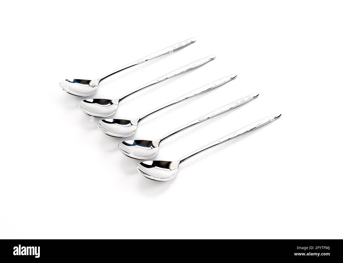 A set of Korean flat metal spoon on white background Stock Photo - Alamy