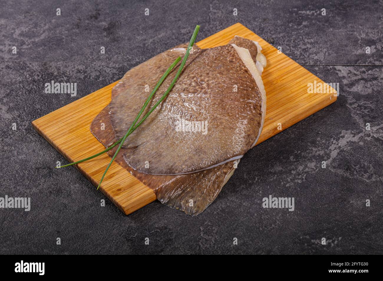 Raw stingray wings tasty fillet for cooking Stock Photo - Alamy