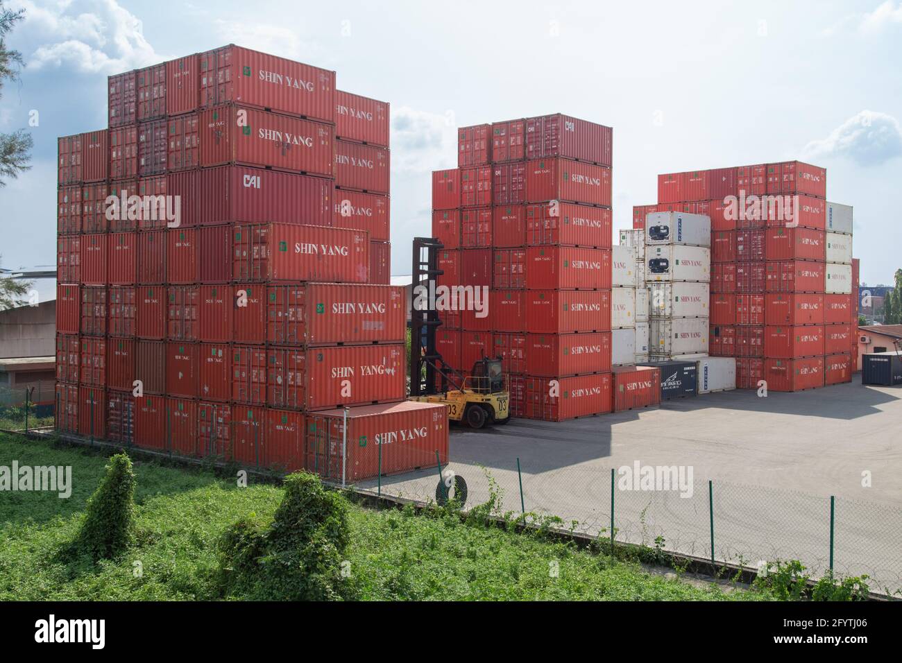 Intermodal cargo containers depot Stock Photo - Alamy
