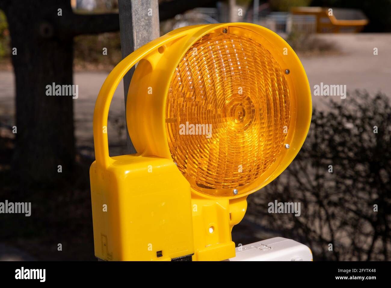 An orange warning light at a construction site Stock Photo - Alamy