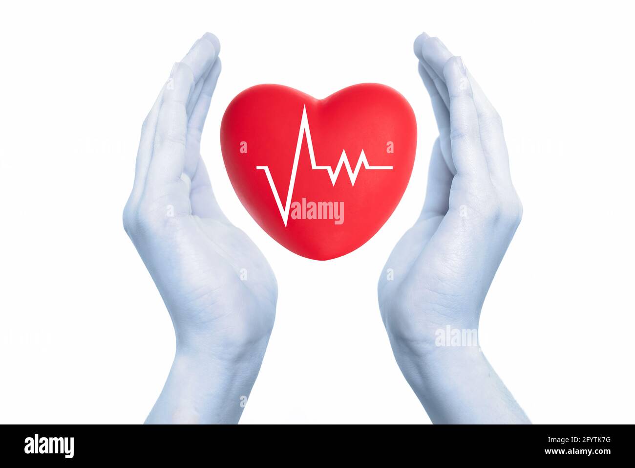 Female hands raised up in a gesture of holding symbol of people heart ...