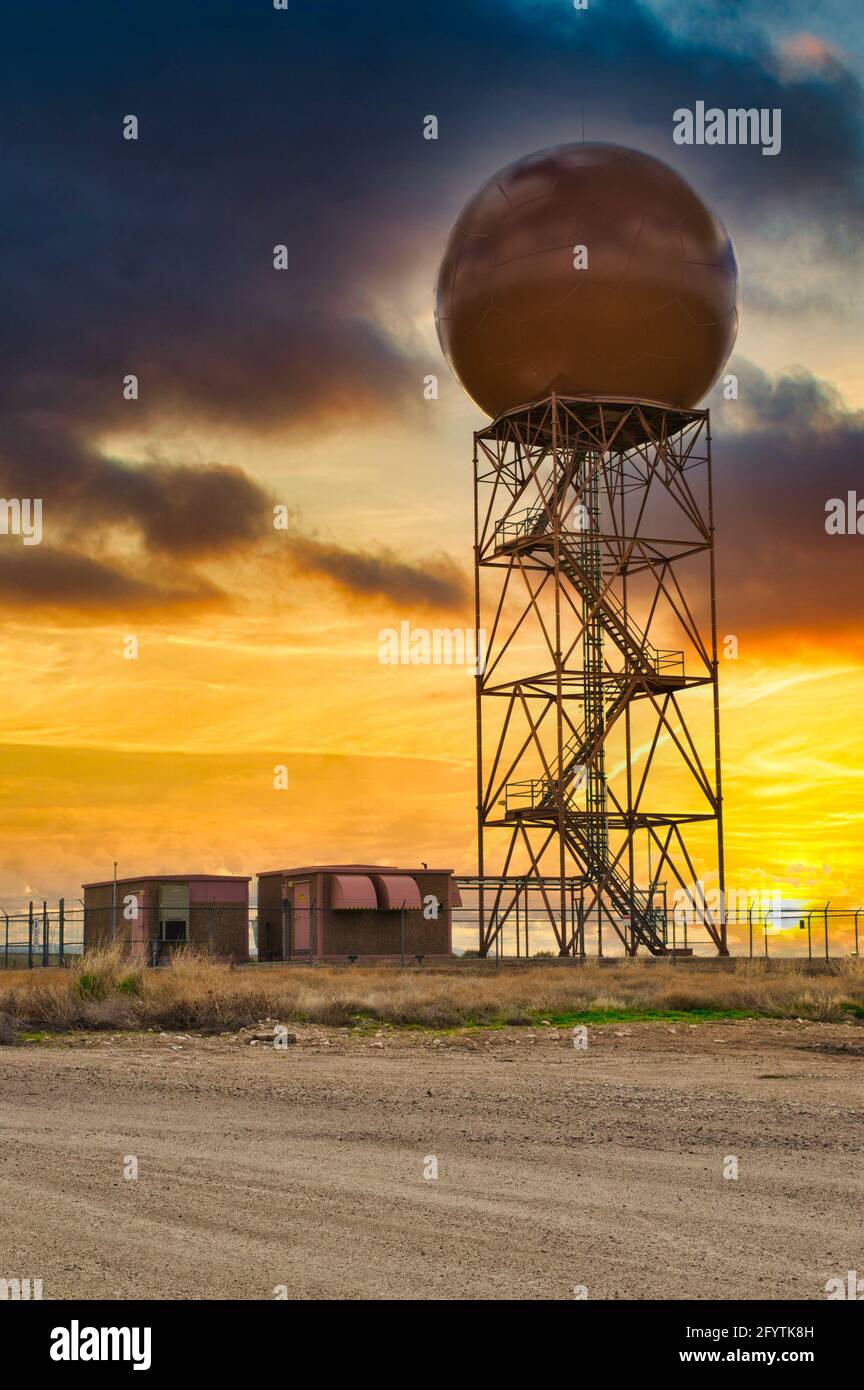 A vertical shot of a weather tower under the sunset sky Stock Photo - Alamy