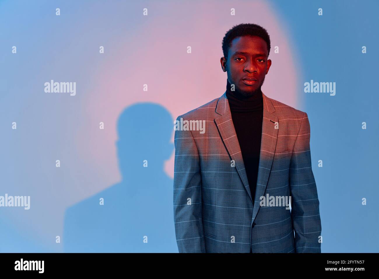 Bright neon blue jacket hi-res stock photography and images - Alamy