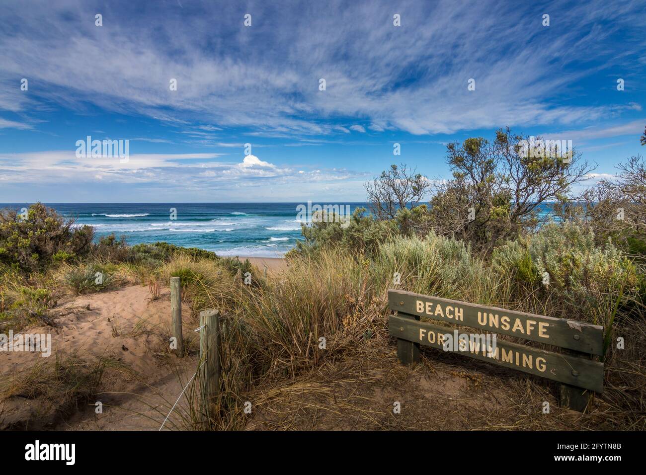 A sign declaring beach unsafe for swimming in Bells Beach, Australia ...