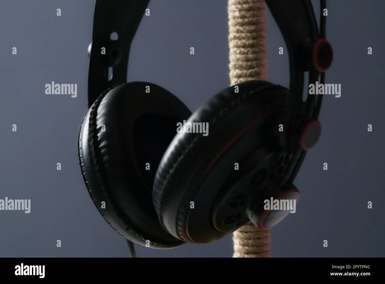 A shot of the big headphones used for music studio recording hanged ...