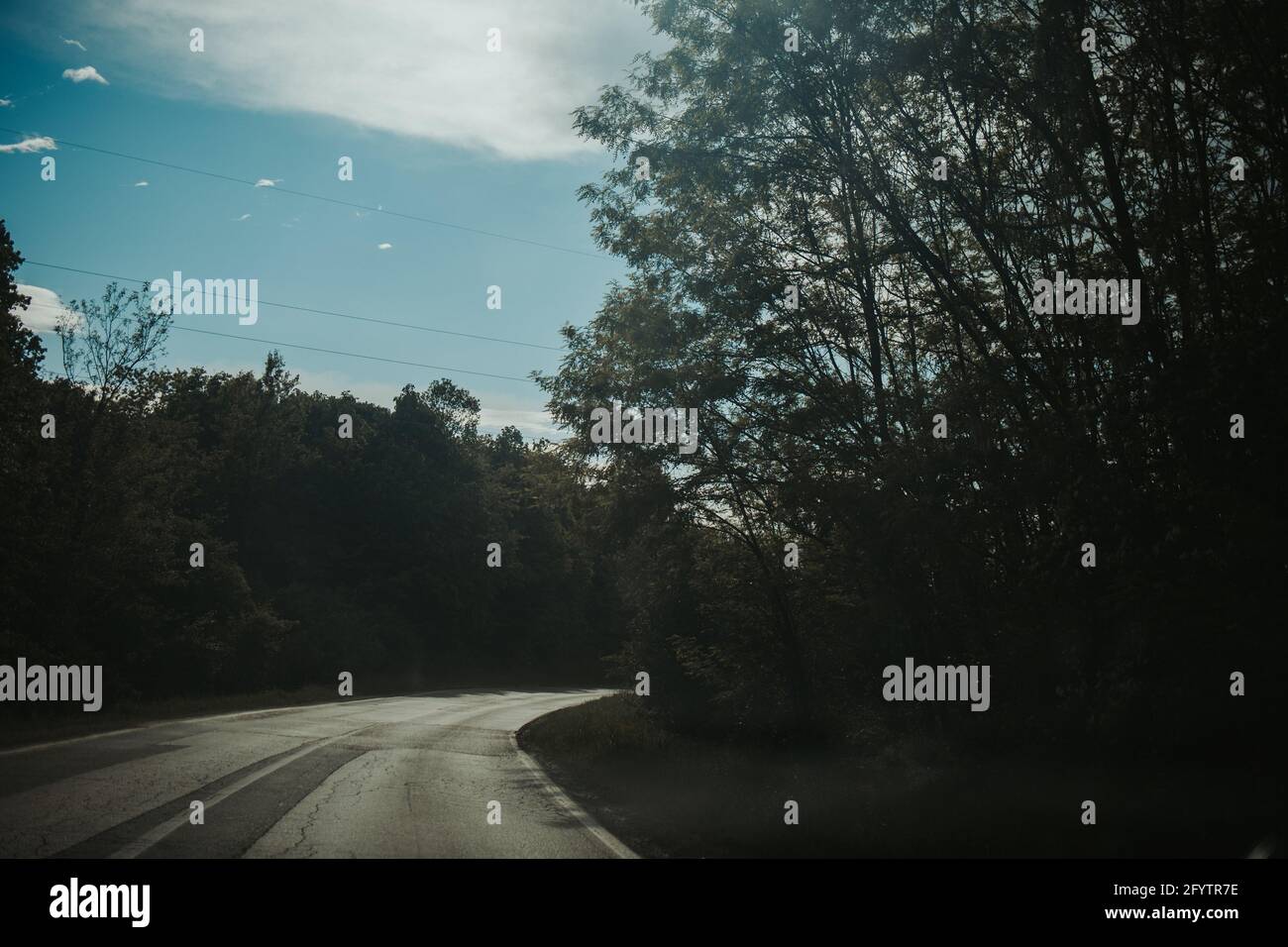 Long twisting road hi-res stock photography and images - Alamy