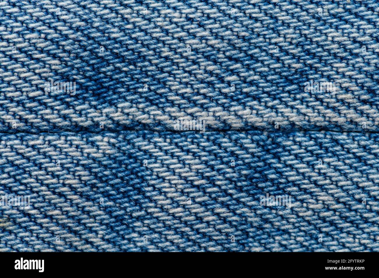 Jeans close up background. Denim stitching Stock Photo - Alamy