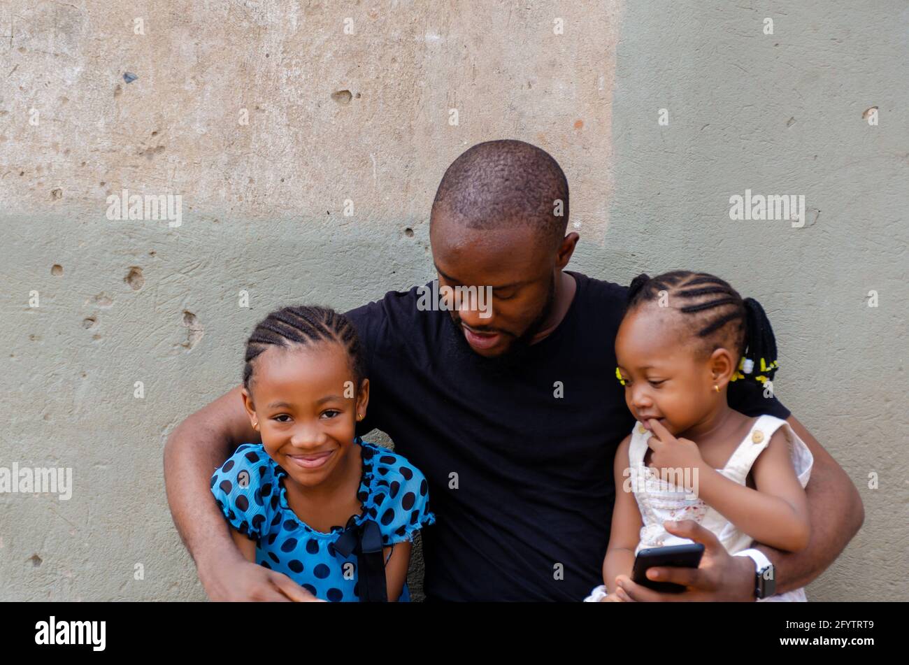 handsome african american dad feeling excited as he is bonding with his ...