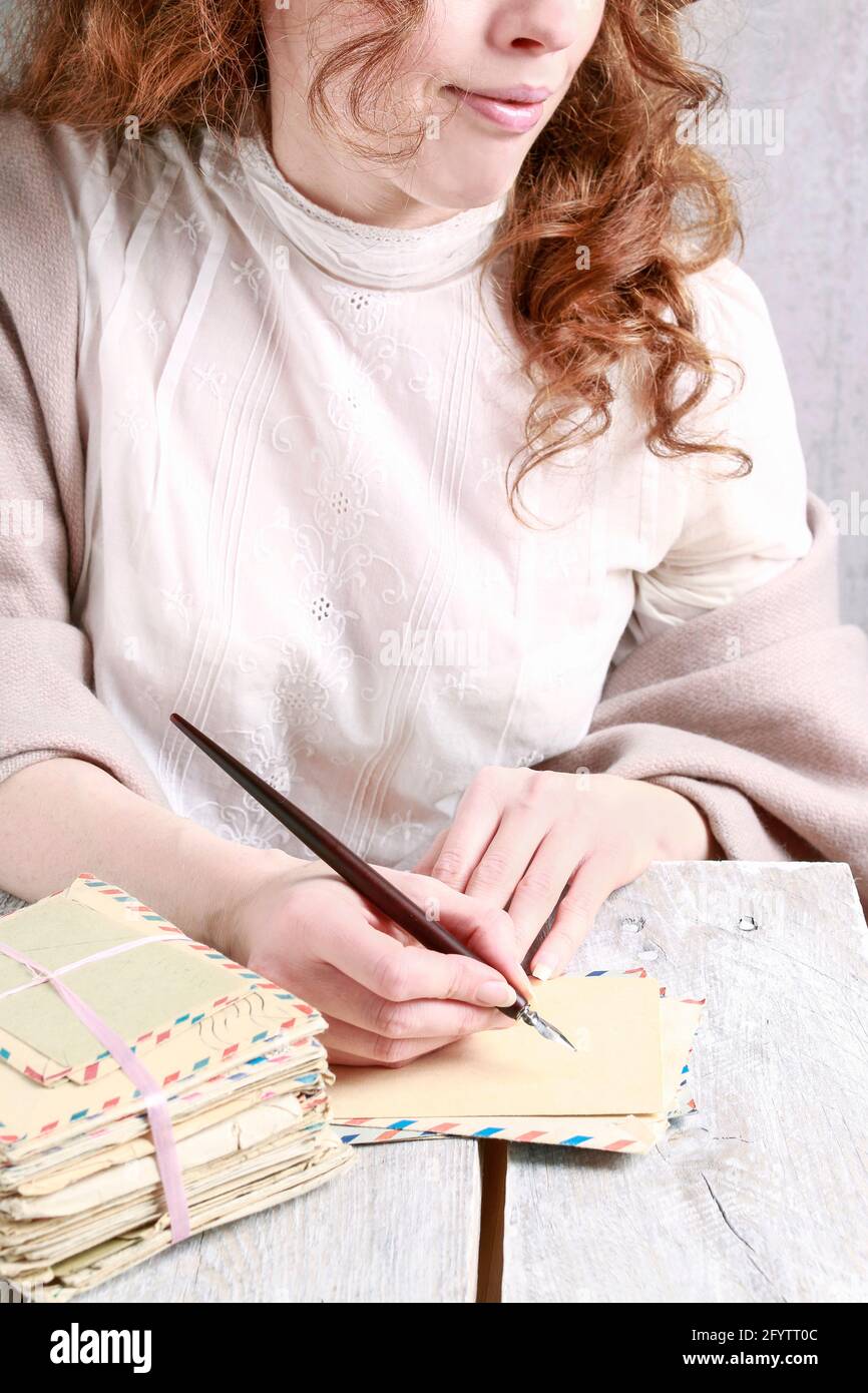 Old lady writing letter hi-res stock photography and images - Alamy