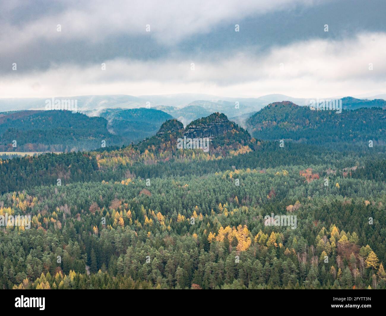 Sunset at Mountains. Deep valley full of colorful trees within autumn ...
