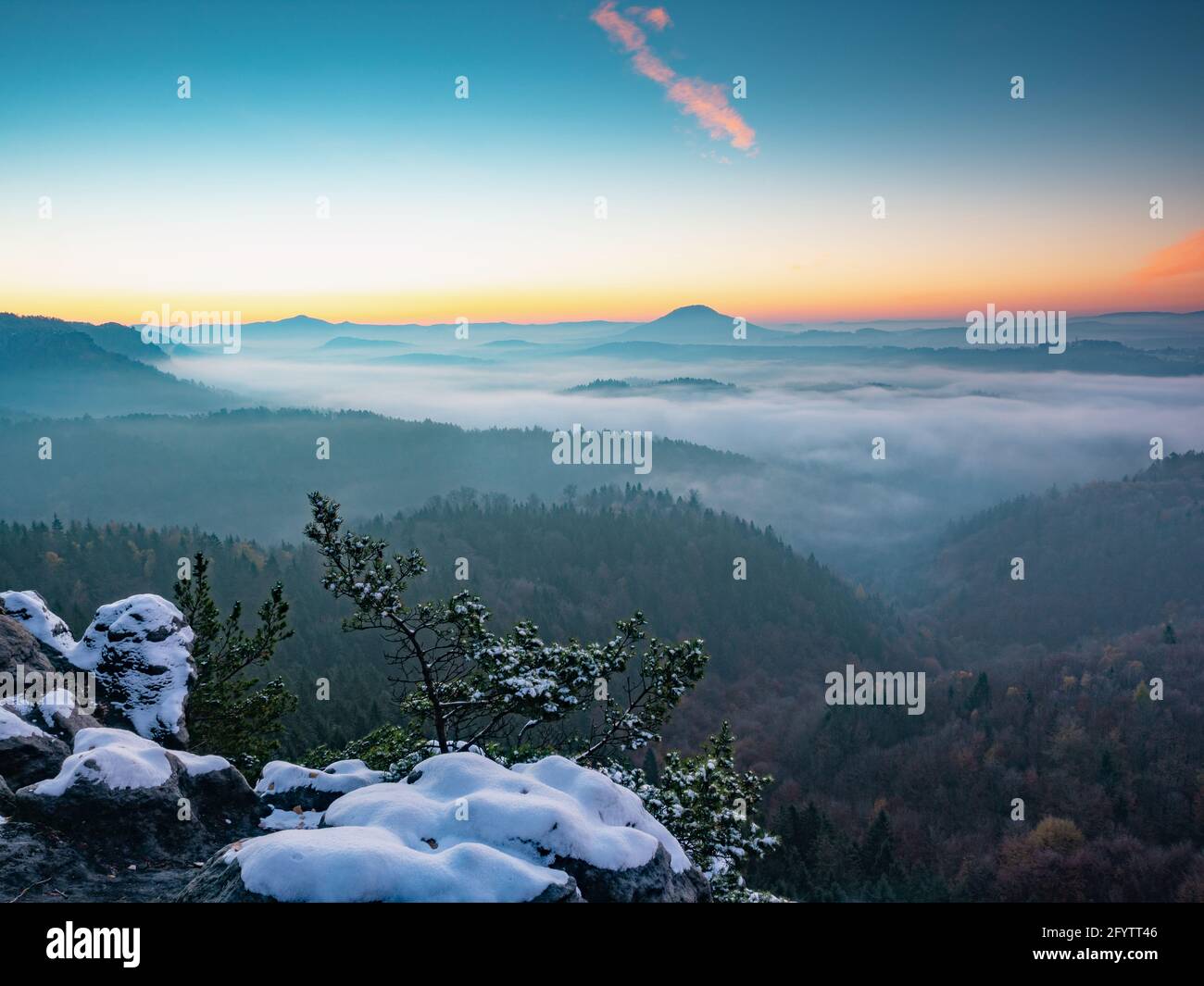 Snowy peak early morning. Chill awaking in misty country. Morning sun ...