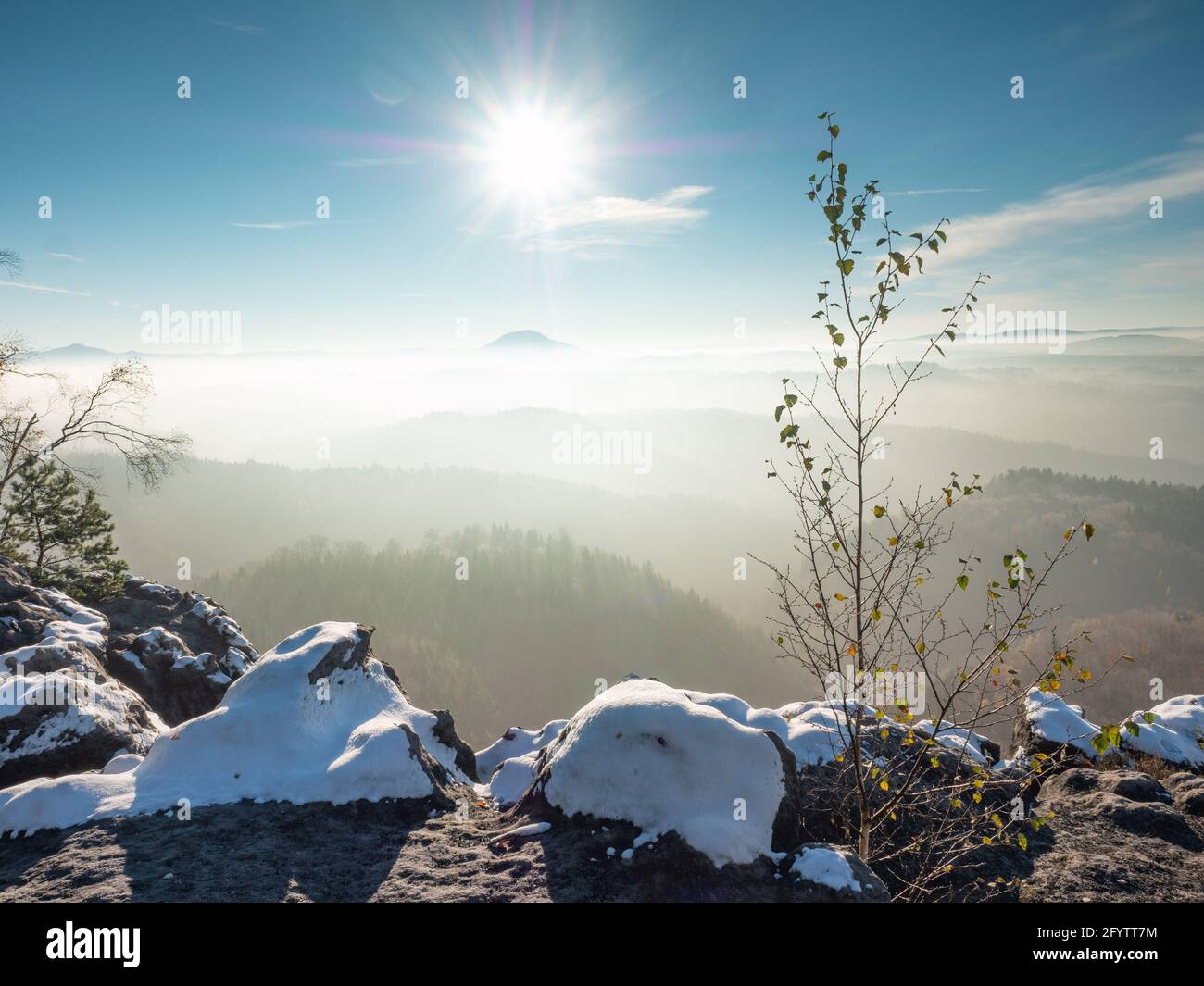 Snowy peak early morning. Chill awaking in misty country. Morning sun ...