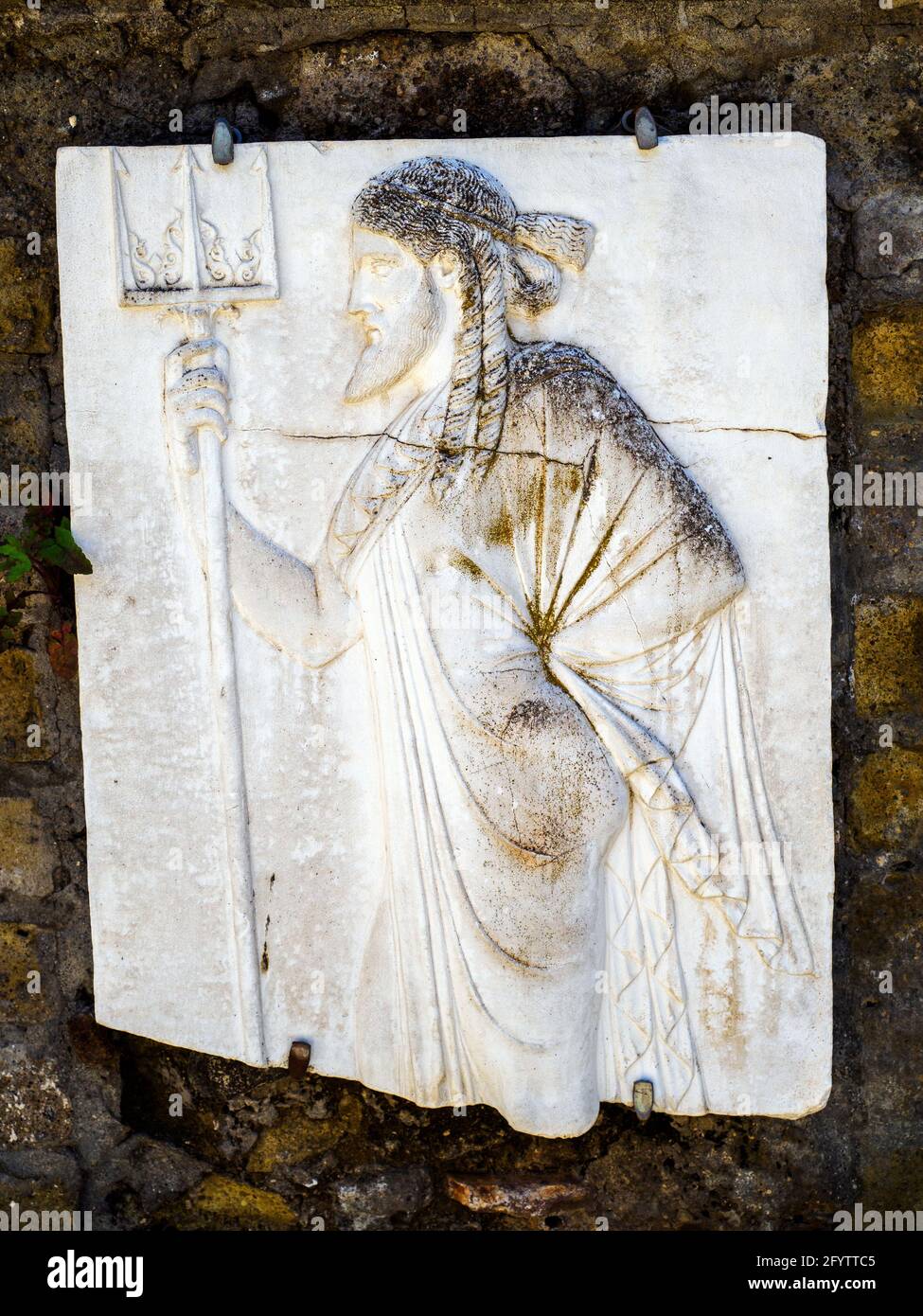 Marble relief of the god Neptune in The Sacred Area - Herculaneum ruins ...