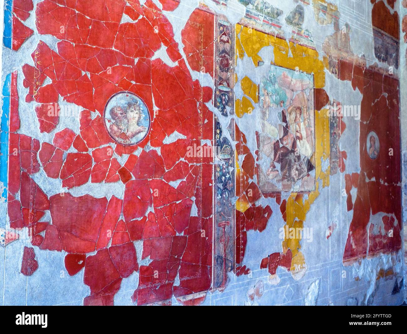 Fresco decorated walls of the tablinum (central room at the end of the ...