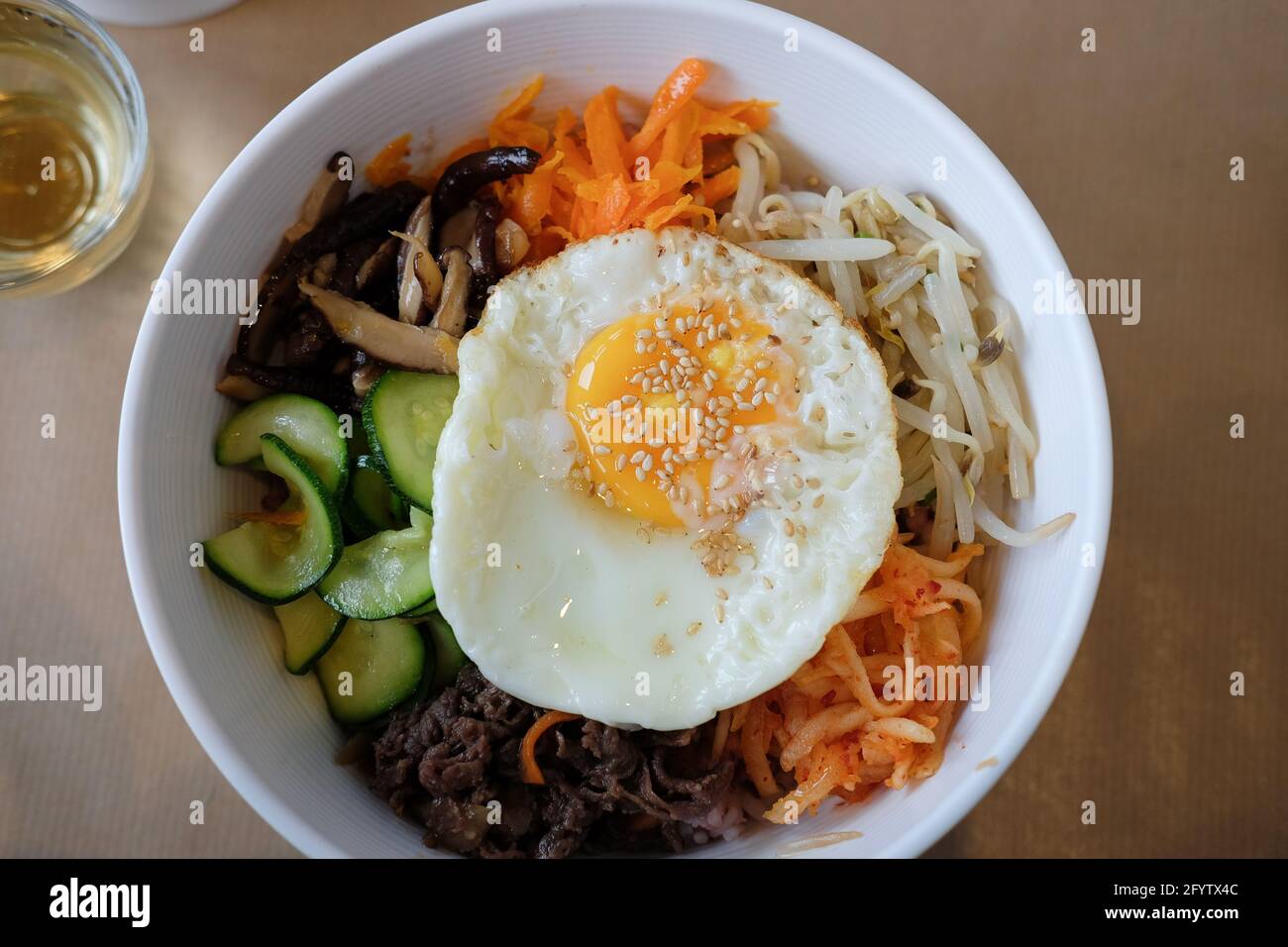 A top view of classic Korean Bibimbap dish Stock Photo - Alamy