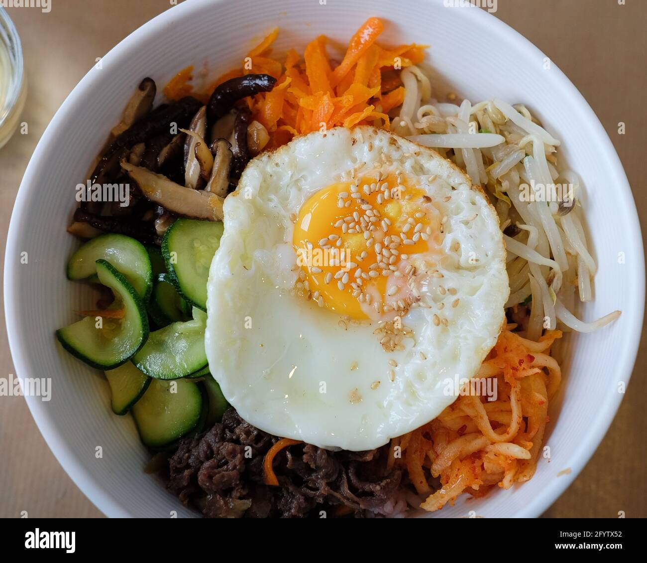 A top view of classic Korean Bibimbap dish Stock Photo - Alamy