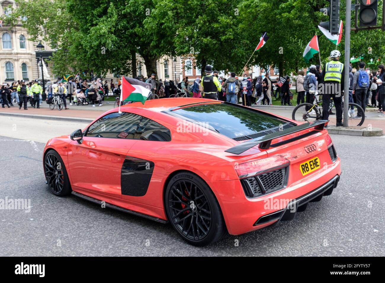 Audi R8 Coupe bearing Palestinian flag drives past pre palestine Rally ...