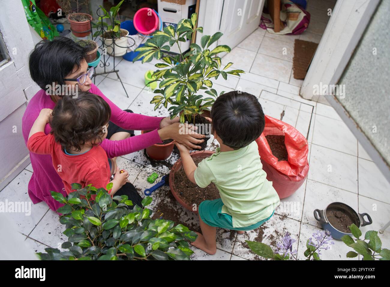 Woman observing women and children hi-res stock photography and images ...