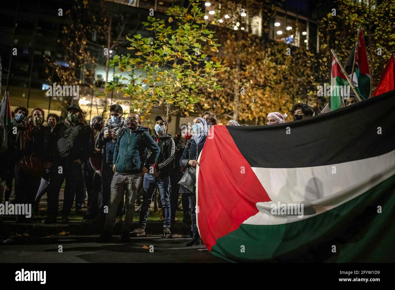 Santiago, Chile. 19th May, 2021. A demonstrator holds a Palestinian ...