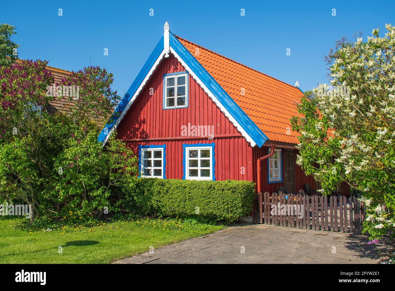 Beautiful old Lithuanian traditional wooden houses of the Curonian Spit ...
