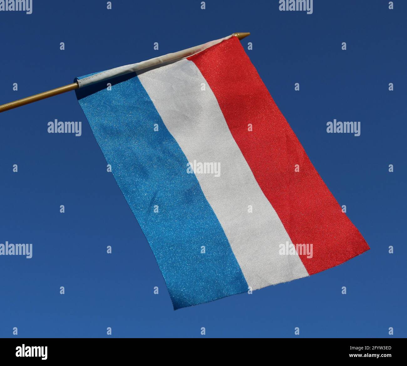 Dutch flag flying, Flag of The Neherlands flying Stock Photo - Alamy