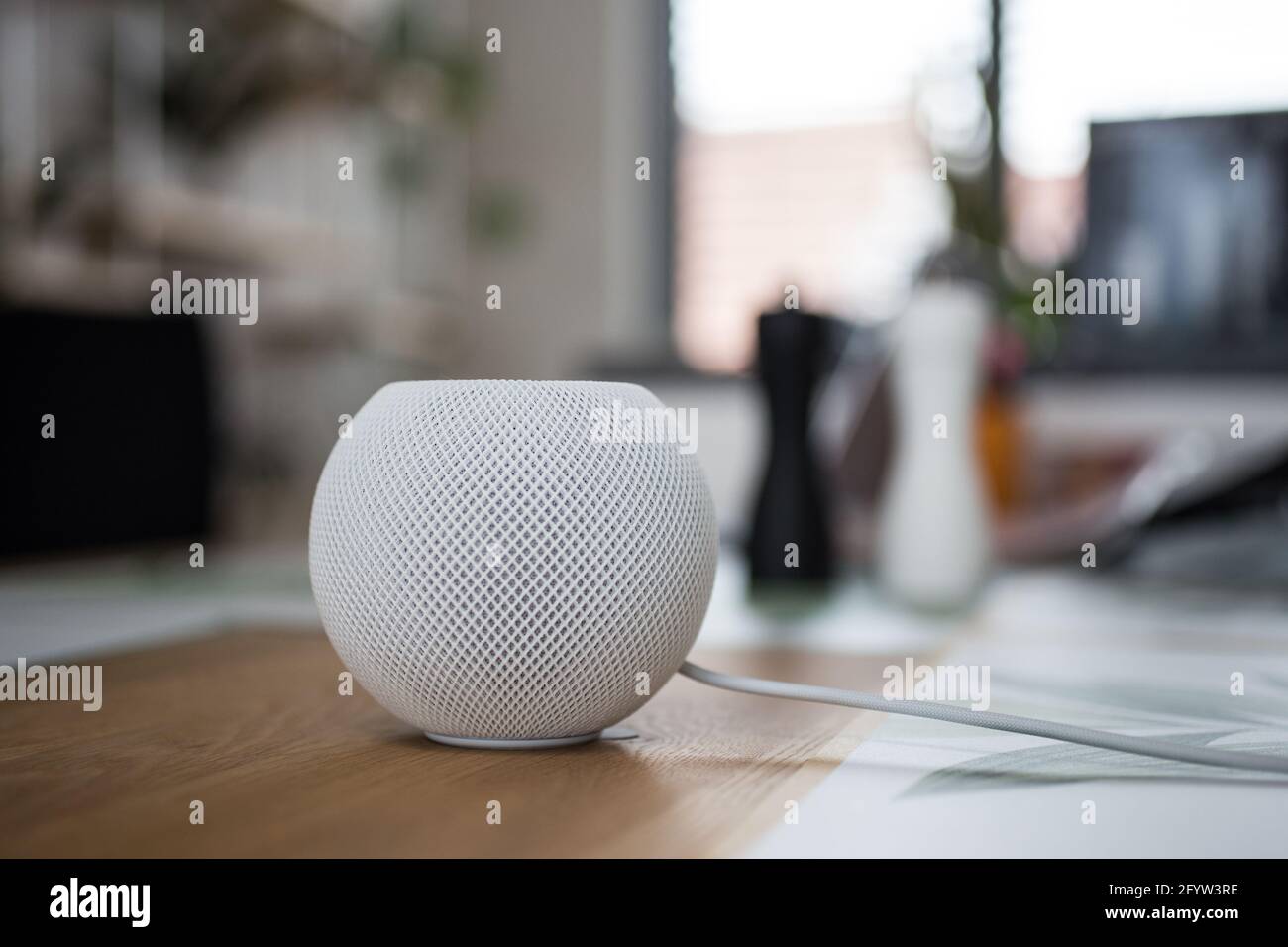 Smart speaker on table desk, voice controlled, device, smart home ...