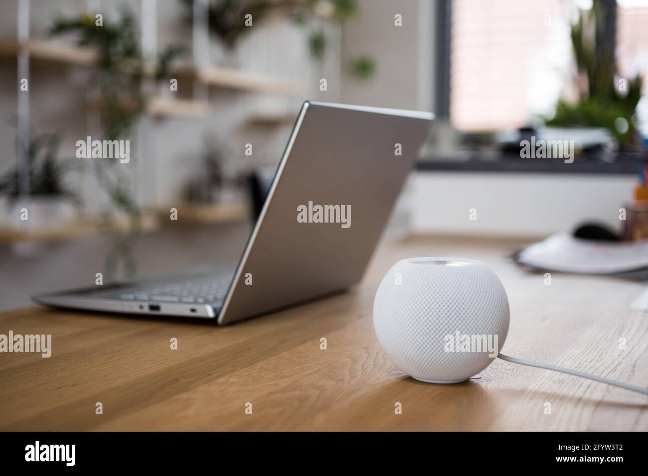 Smart speaker on table desk, voice controlled, device, smart home ...