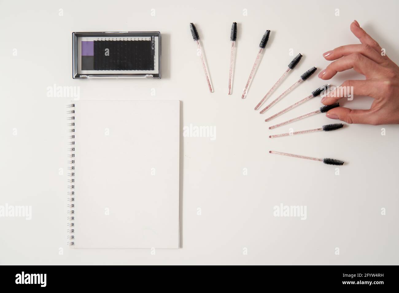 Set of eyelash instruments with notepad and copyspace Stock Photo - Alamy