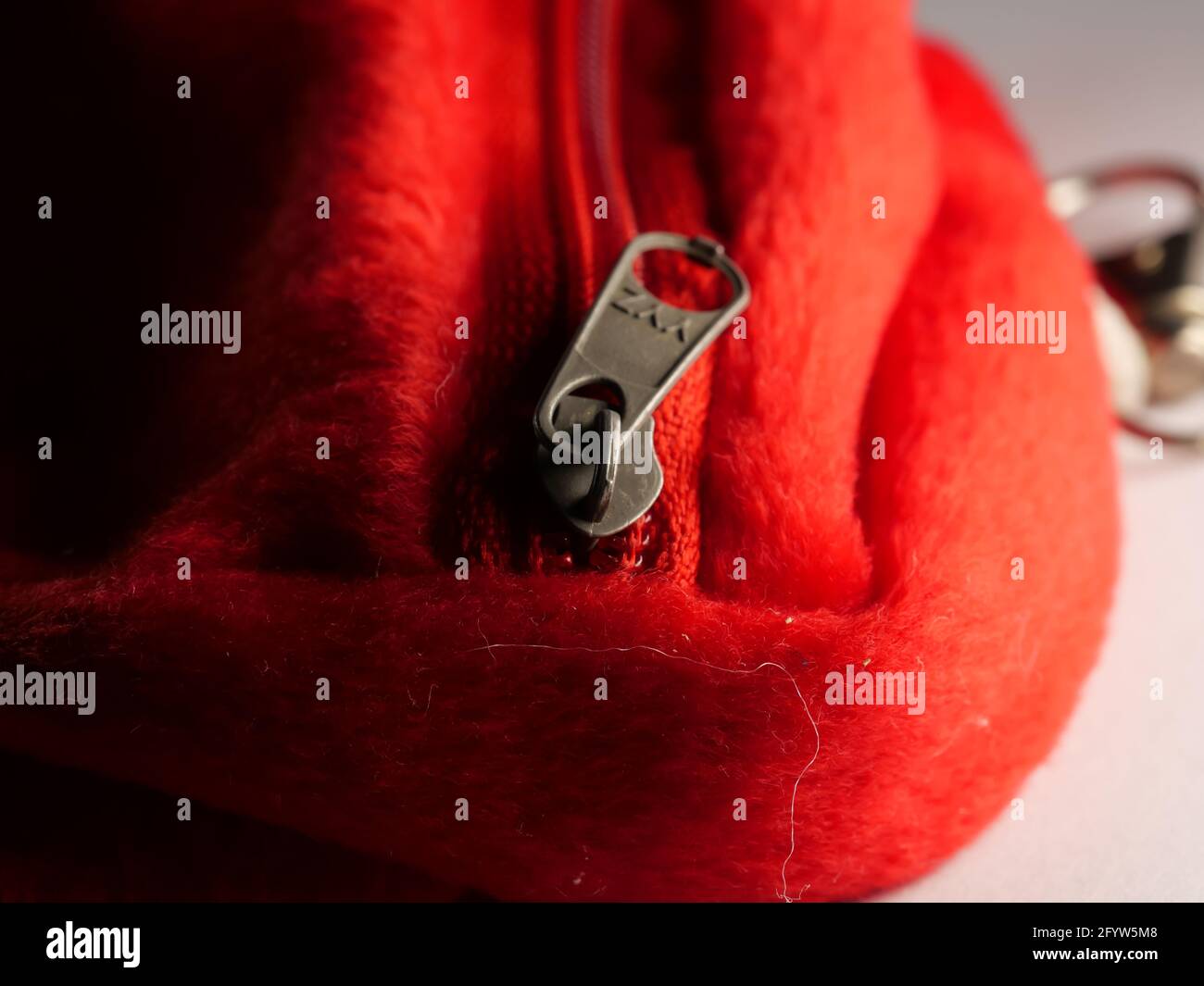 Closeup shot red zipper hi-res stock photography and images - Alamy