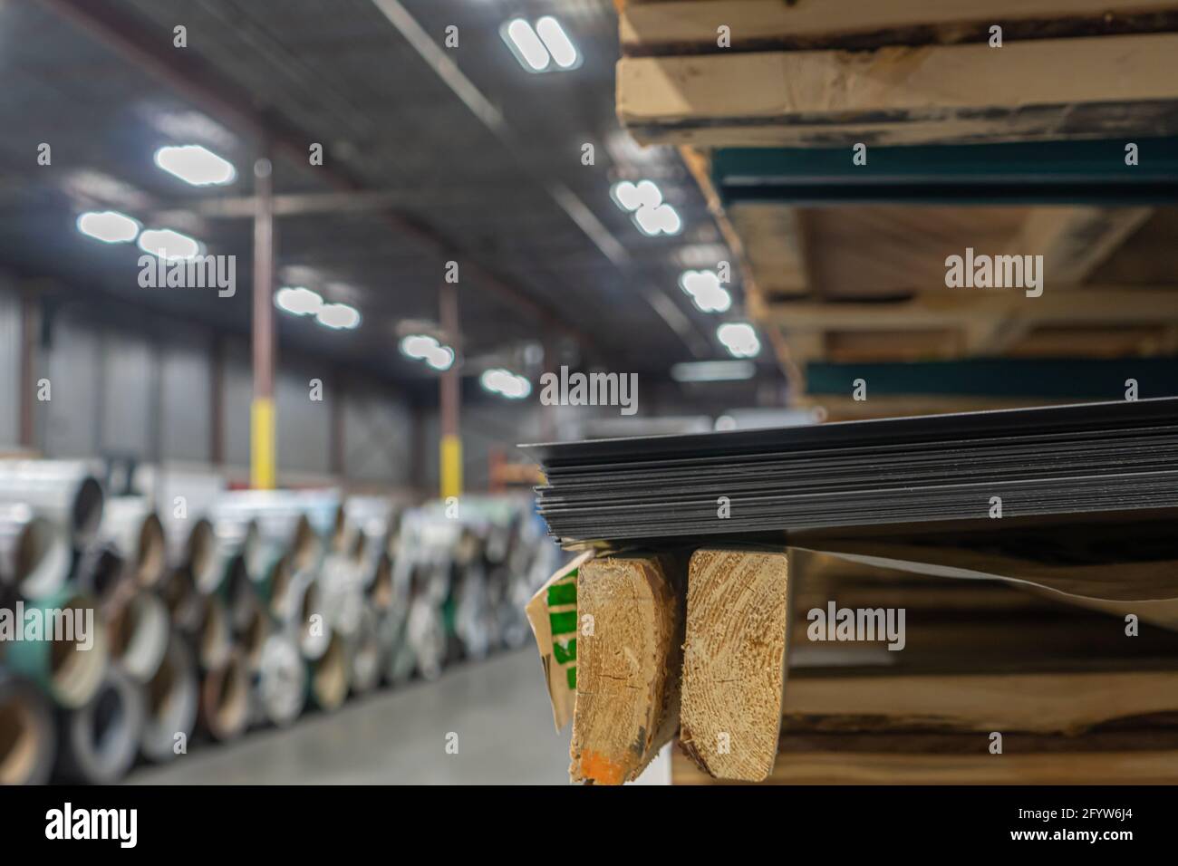 Roofing Metal Factory warehouse and shelving with metal rolls Stock ...