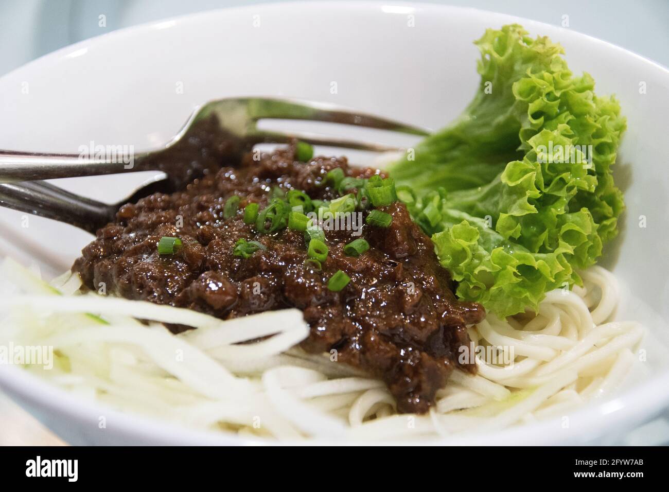 Zha jiang mian, chinese cuisine, noodles topped with fermneted soy bean ...