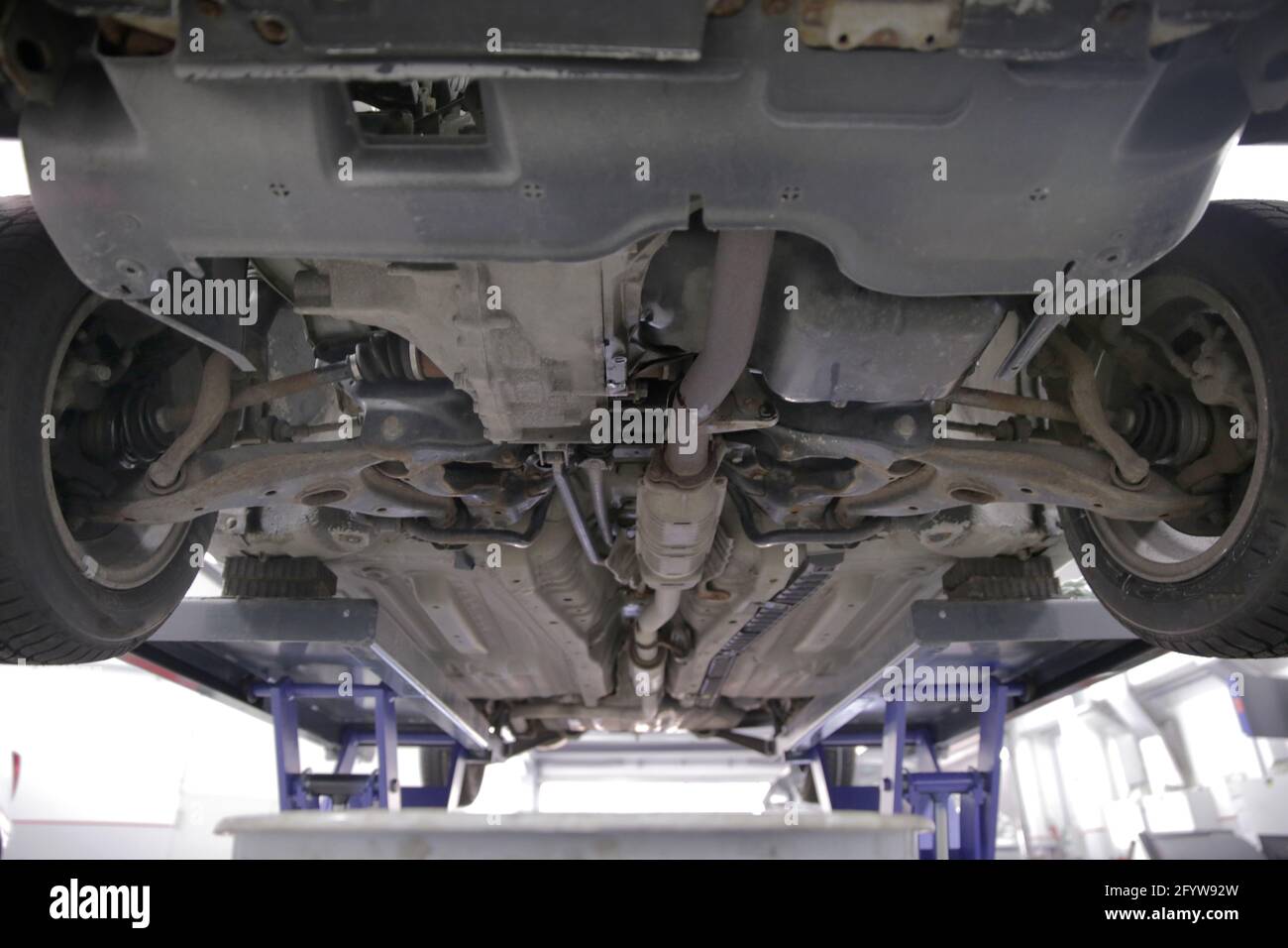 A vertical shot of a car at a car service garage Stock Photo - Alamy