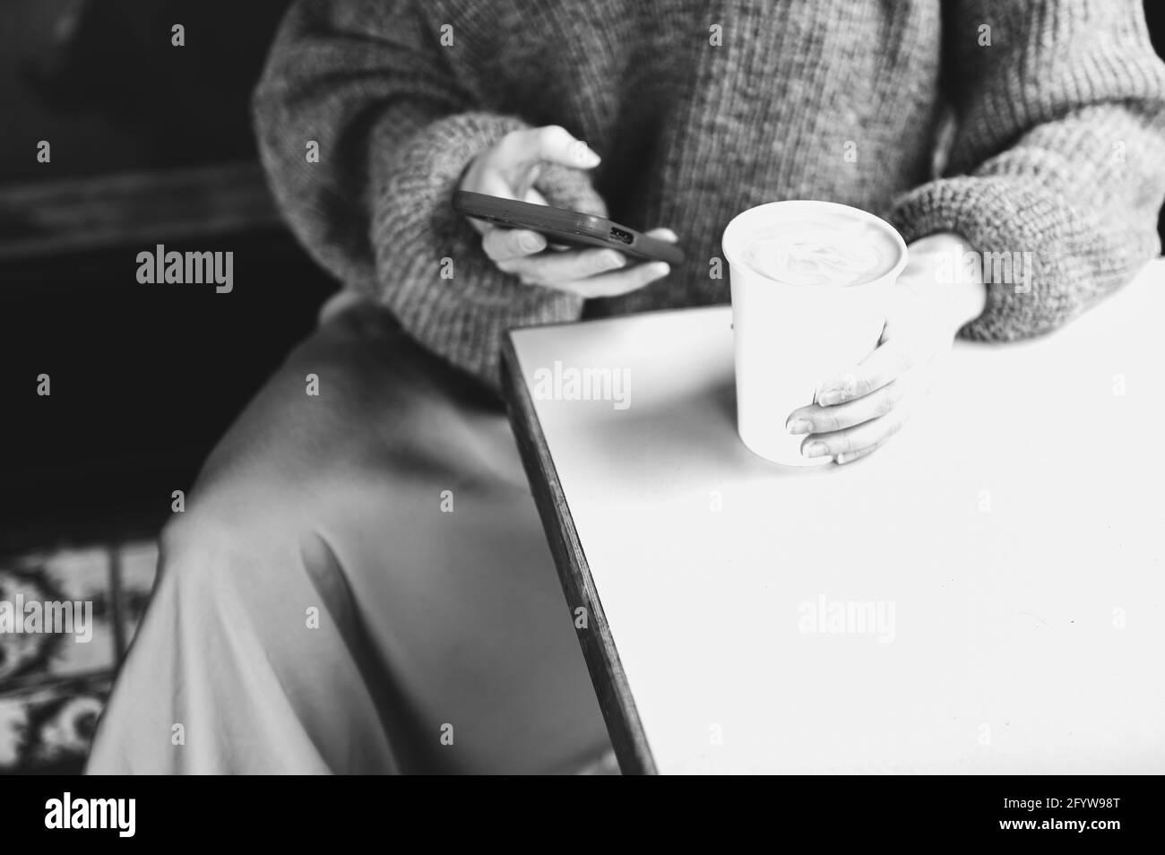 Pretty woman drinking coffee Black and White Stock Photos & Images - Alamy