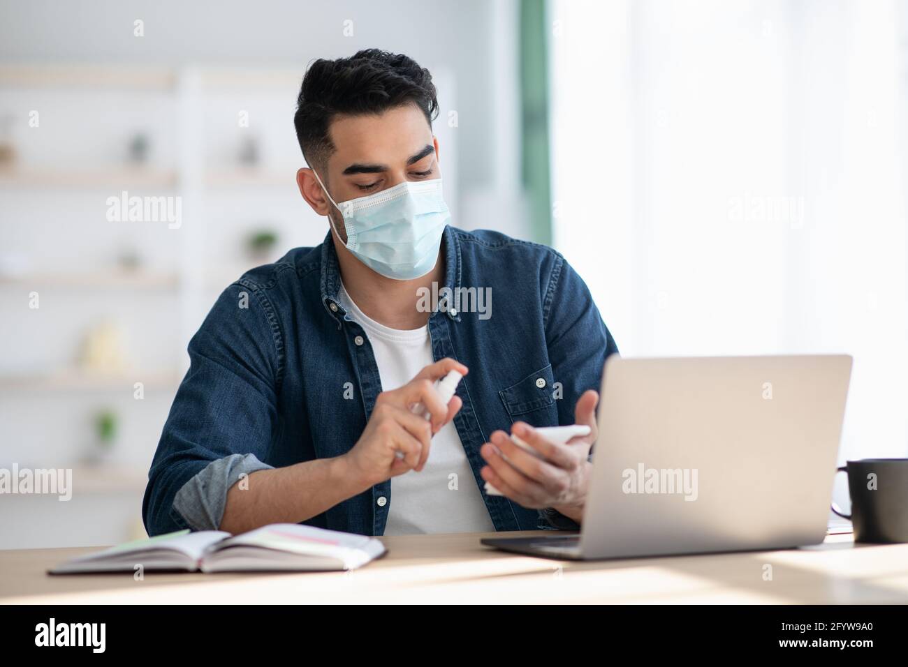 Middle eastern man cleaning hi-res stock photography and images - Alamy