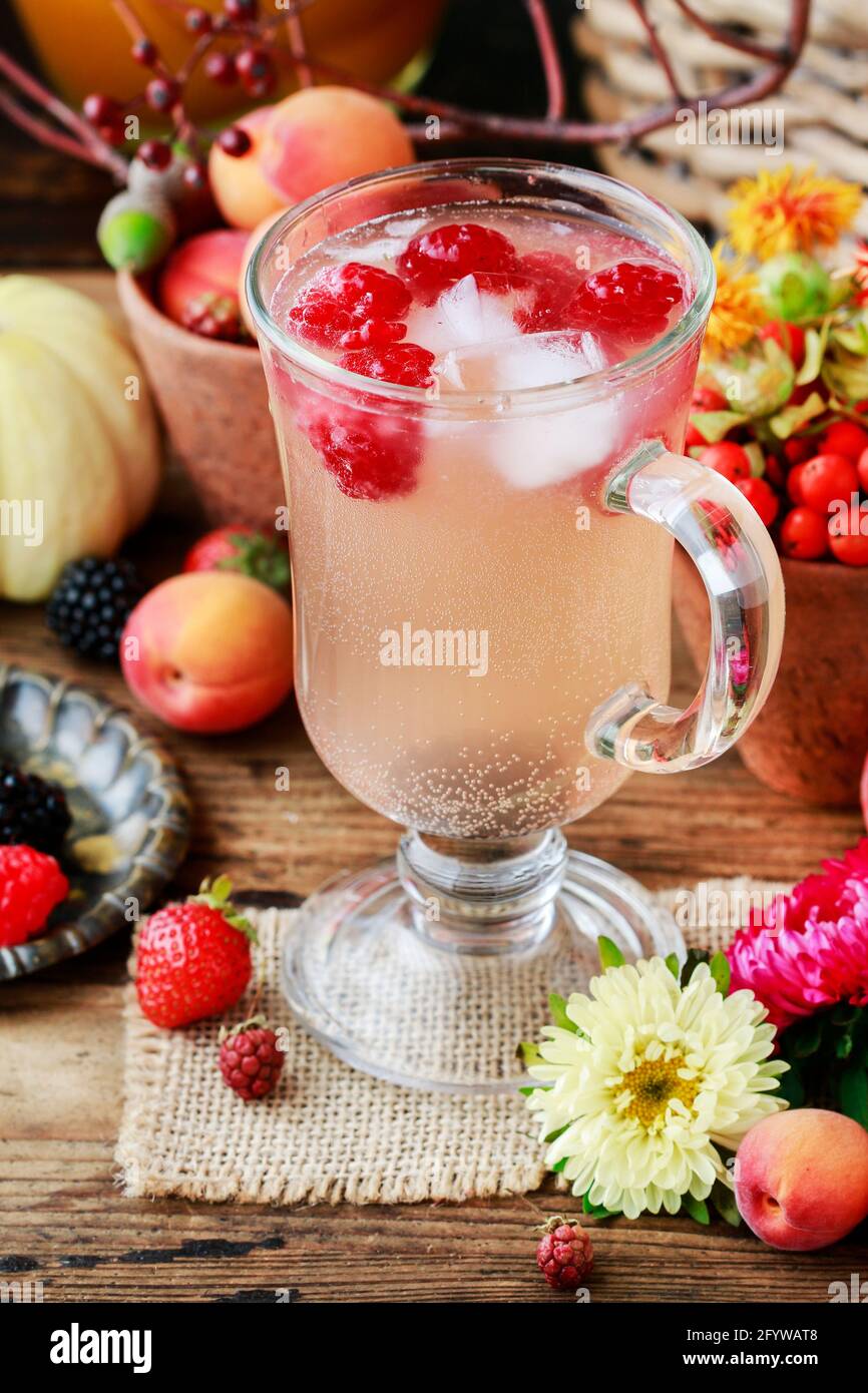 Homemade fruit lemonade with icecubes. Party drink Stock Photo - Alamy