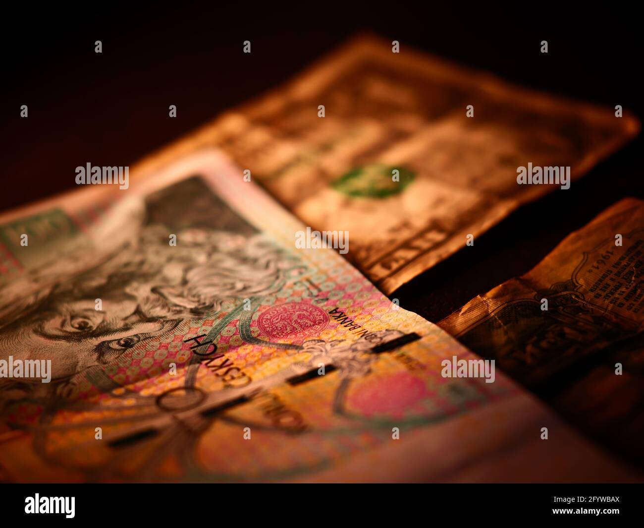 A closeup shot of Czech money with dollars on a blurred background ...
