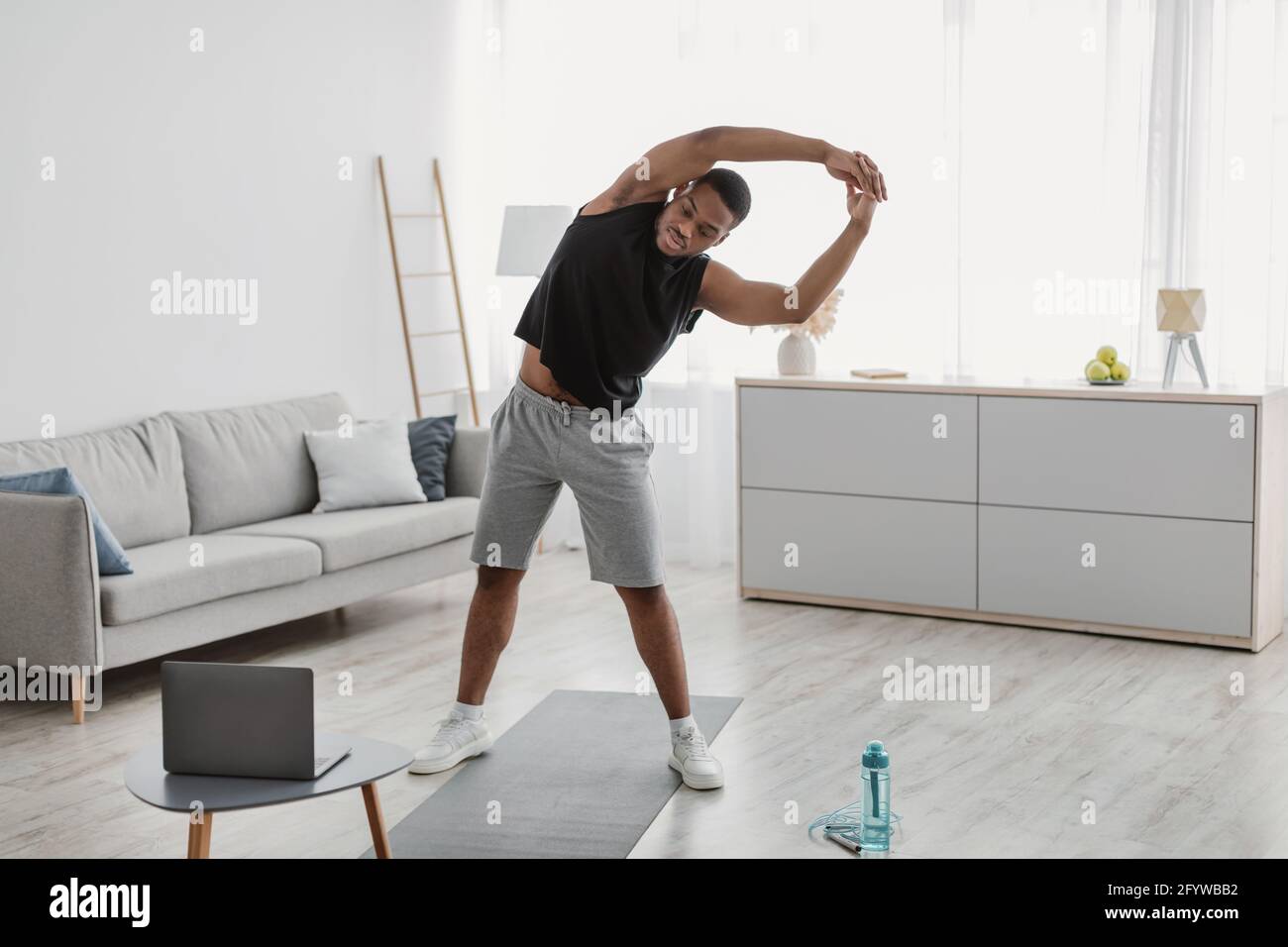 Standing side bend hi-res stock photography and images - Alamy