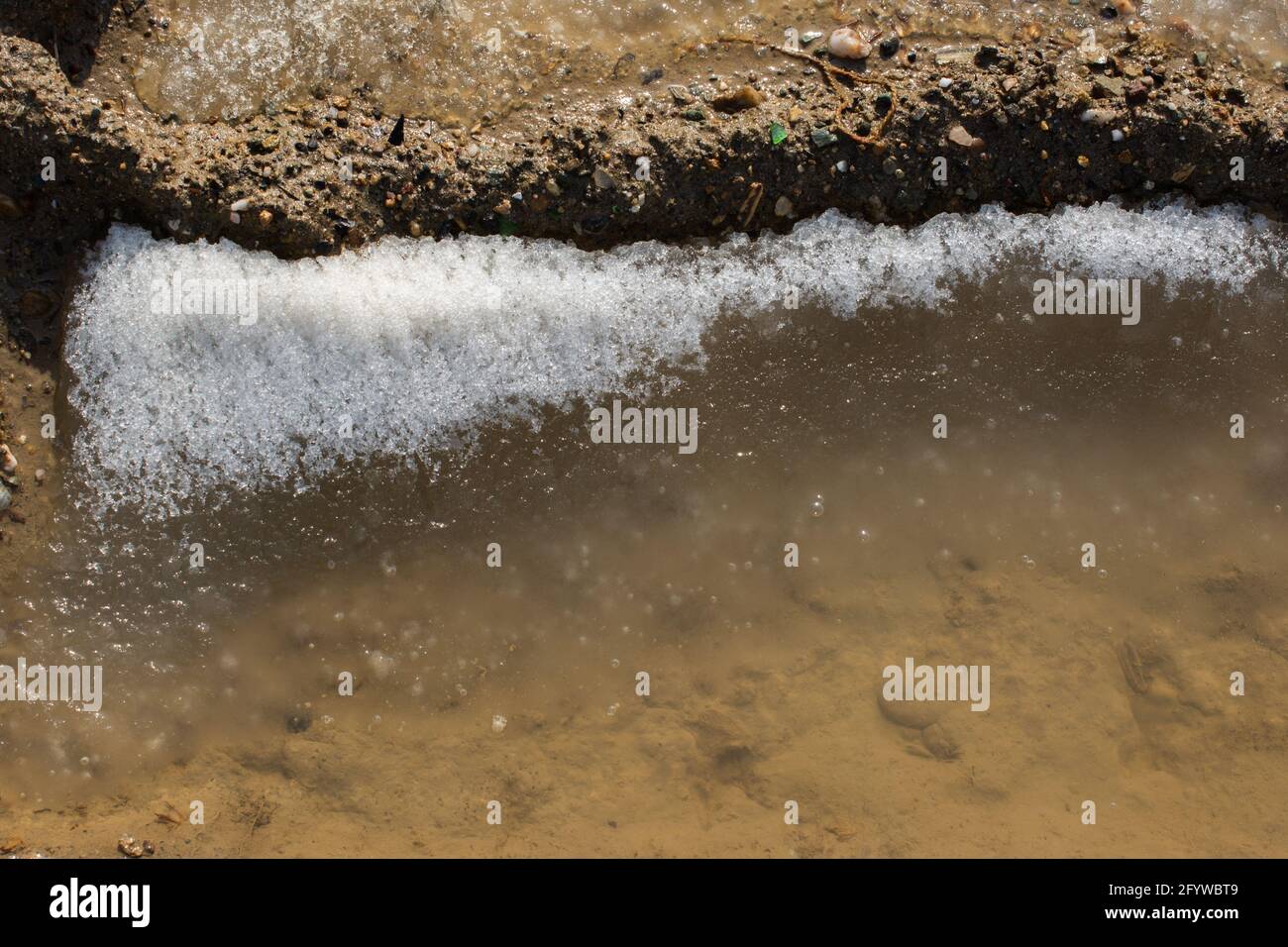A shot of snow on the soil Stock Photo - Alamy