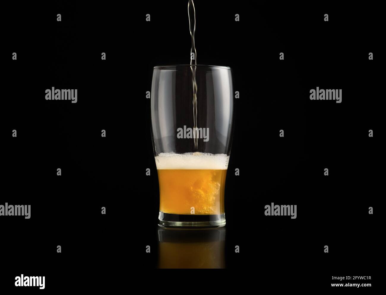 Pouring drinks into glass, lager tasting, beer business and brewery ...