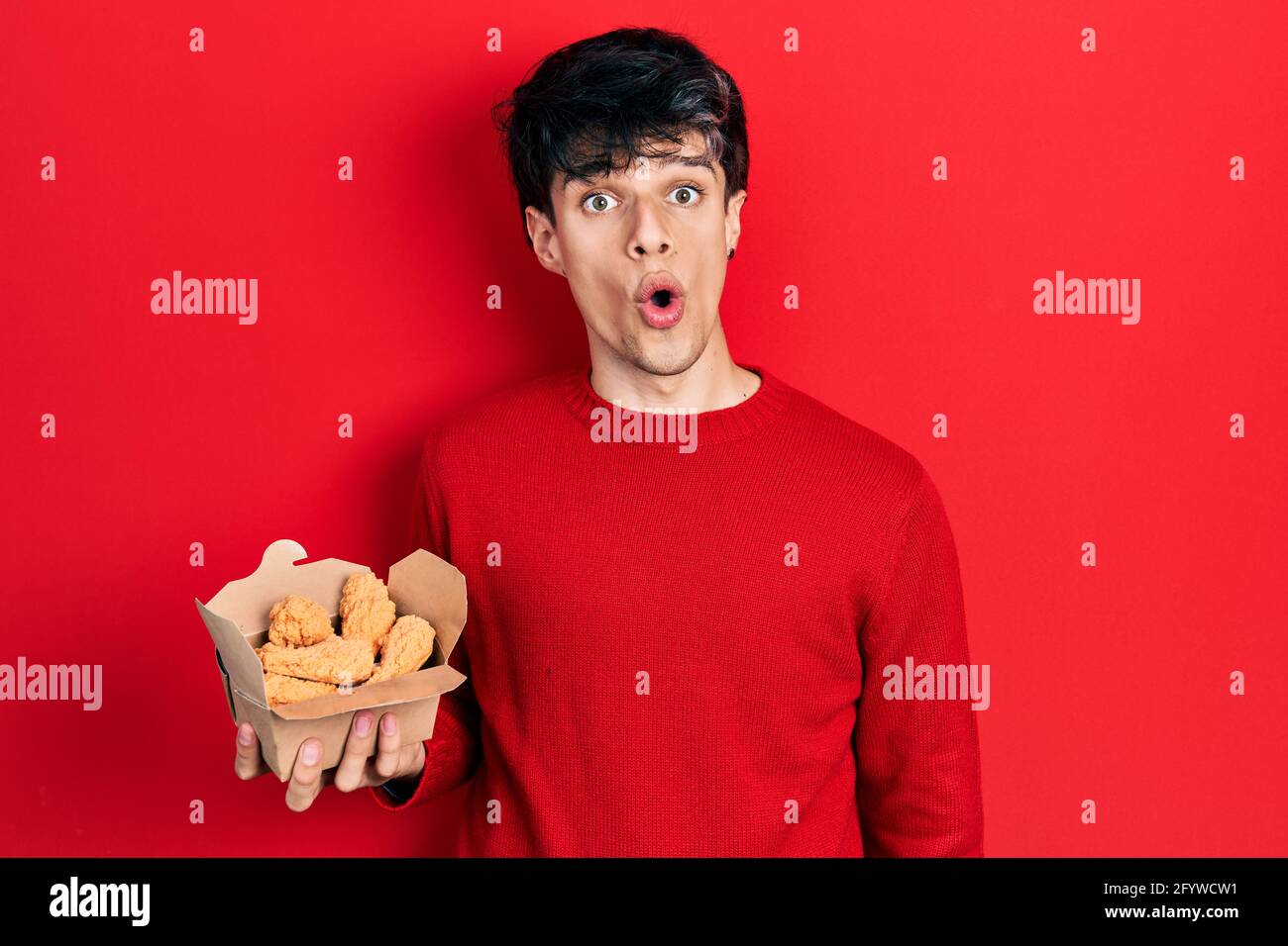 Man eating chicken wings High Resolution Stock Photography and Images ...
