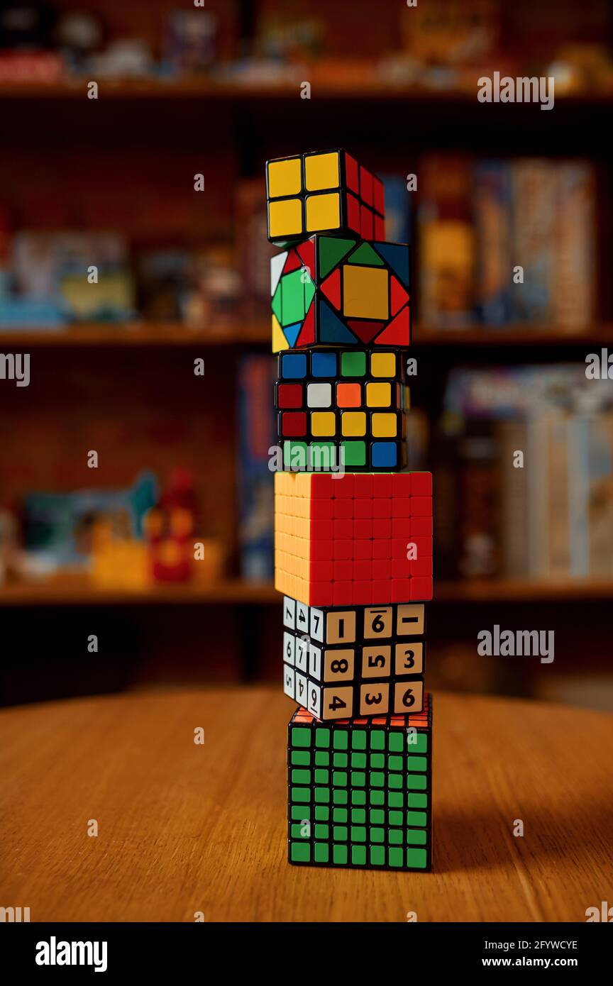 Tower of colorful puzzle cubes on table, nobody Stock Photo - Alamy