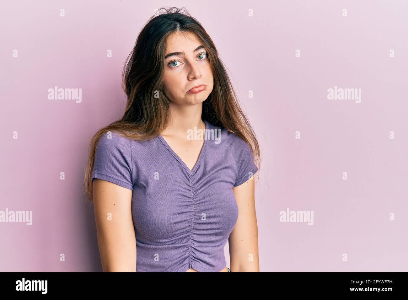 Young caucasian woman wearing casual clothes depressed and worry for ...