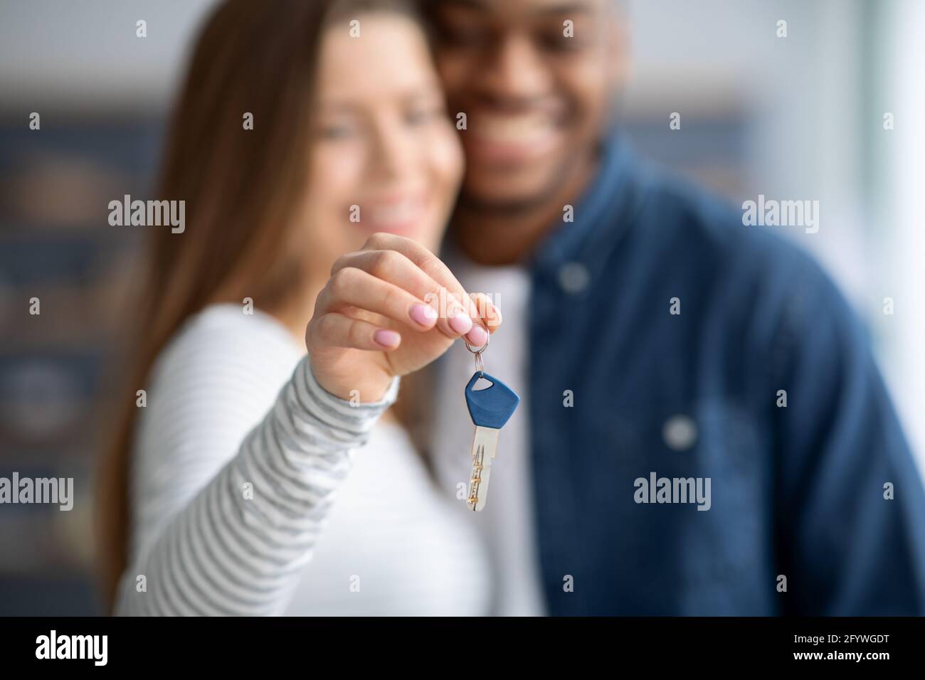 Real Estate Concept. Closeup Of Interracial Married Couple Holding Home ...