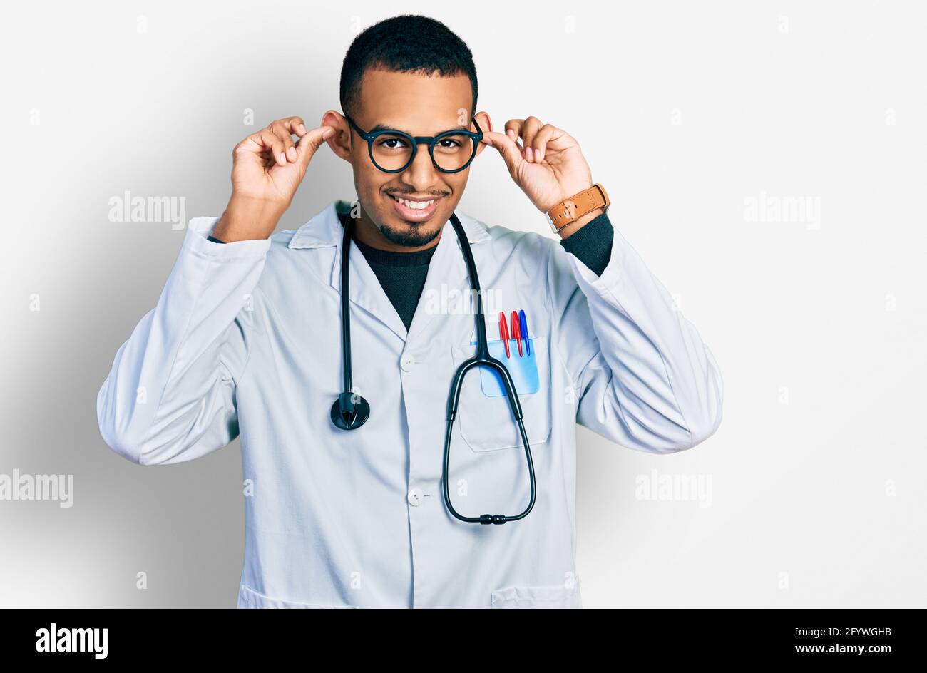 Black african male doctor pulling hi-res stock photography and images ...