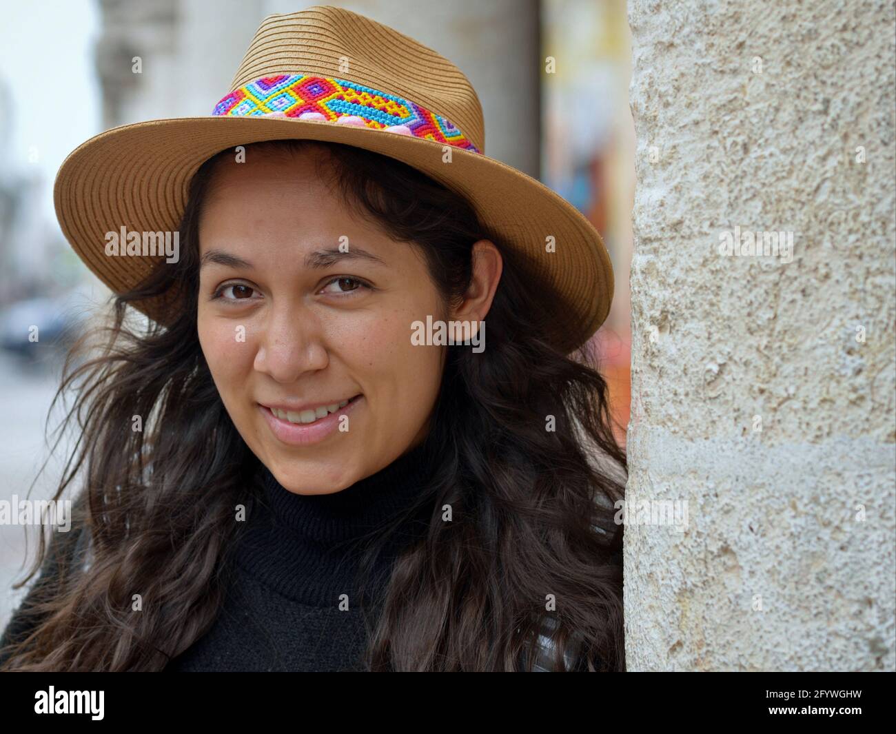 Young beautiful Mexican brunette latina woman with thick long hair ...