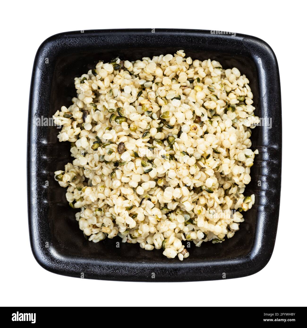 top view of cores of hemp seeds in black bowl isolated on white ...