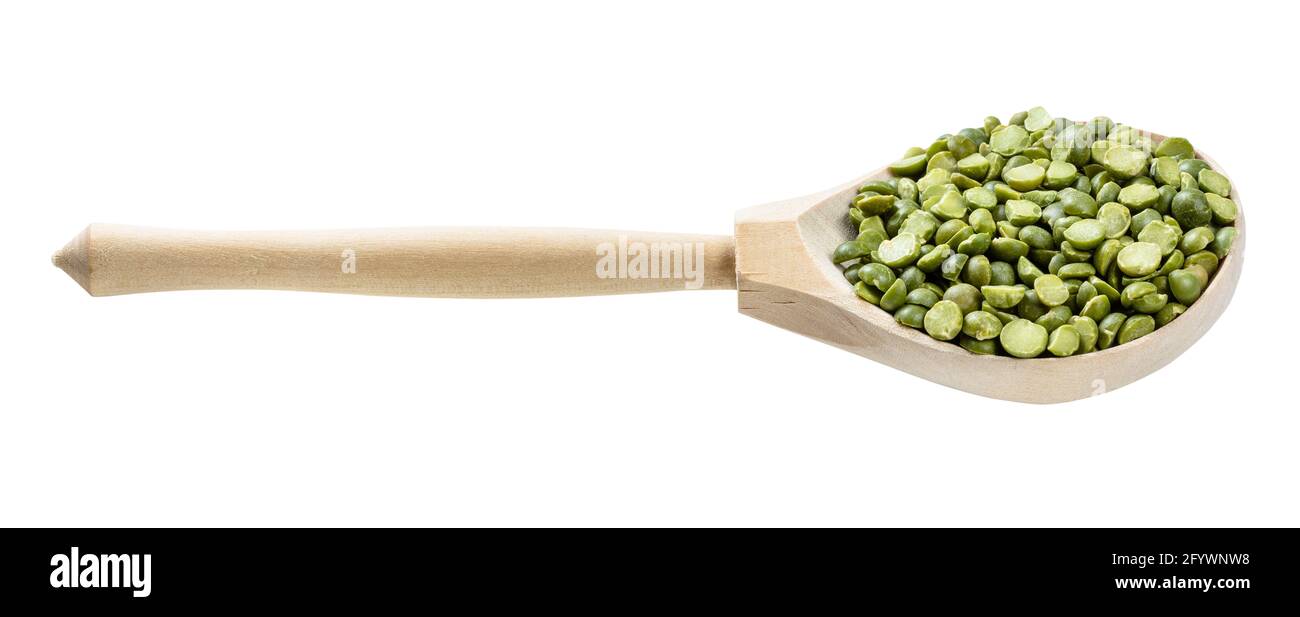 wooden spoon with green split peas isolated on white background Stock ...