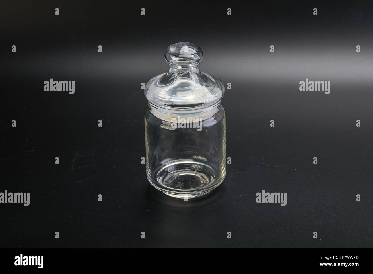 Empty glass jar with lid isolated Stock Photo - Alamy