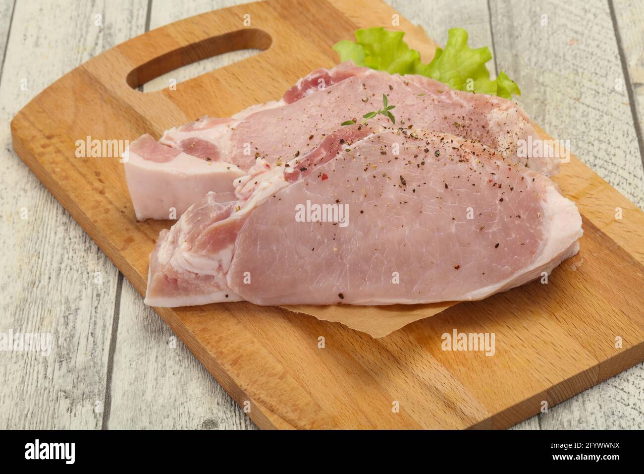 Raw pork meat steak ready for grill Stock Photo - Alamy
