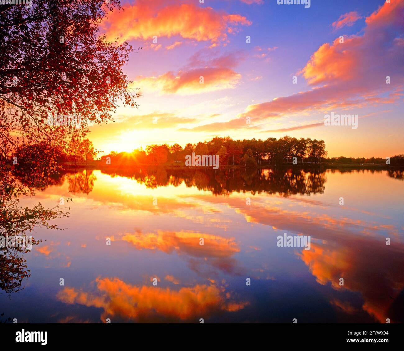 Lakeside, sunset, reflection, autumn Stock Photo - Alamy